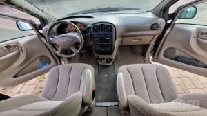 Yellow Chrysler Grand Voyager 2006 in Riga, with an engine capacity of 2.80 L and mileage of 248 thousand km for 600 €, photo 10 on AUTOMOTO.COM.LV