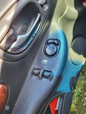Sarkans Chrysler Neon 2004 Kauņa, ar dzinēja tilpumu 2.00 L un nobraukumu 113 tūkst. km par 600 €, foto 5 vietnē AUTOMOTO.COM.LV
