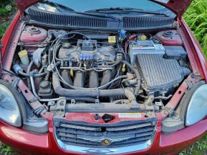 Sarkans Chrysler Neon 2004 Kauņa, ar dzinēja tilpumu 2.00 L un nobraukumu 113 tūkst. km par 600 €, foto 9 vietnē AUTOMOTO.COM.LV