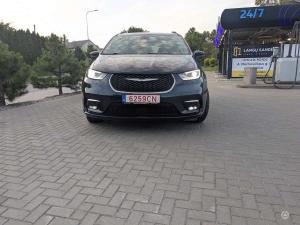 Blue Chrysler Pacifica 2022 in Plunge, with an engine capacity of 3.60 L and mileage of 100 thousand km for 21950 €, photo 13 on AUTOMOTO.COM.LV