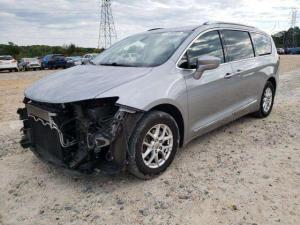 Grey Chrysler Pacifica 2020 in Kaunas, with an engine capacity of 3.60 L and mileage of 150 thousand km for 15999 €, photo 16 on AUTOMOTO.COM.LV