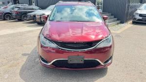 Red Chrysler Pacifica 2017 in Ukmerge, with an engine capacity of 3.61 L and mileage of 238 thousand km for 7700 €, photo 12 on AUTOMOTO.COM.LV
