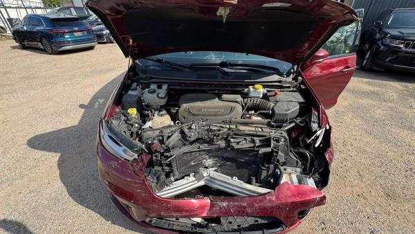 Red Chrysler Pacifica 2021 in Ukmerge, with an engine capacity of 3.61 L and mileage of 125 thousand km for 11499 €, photo 6 on AUTOMOTO.COM.LV