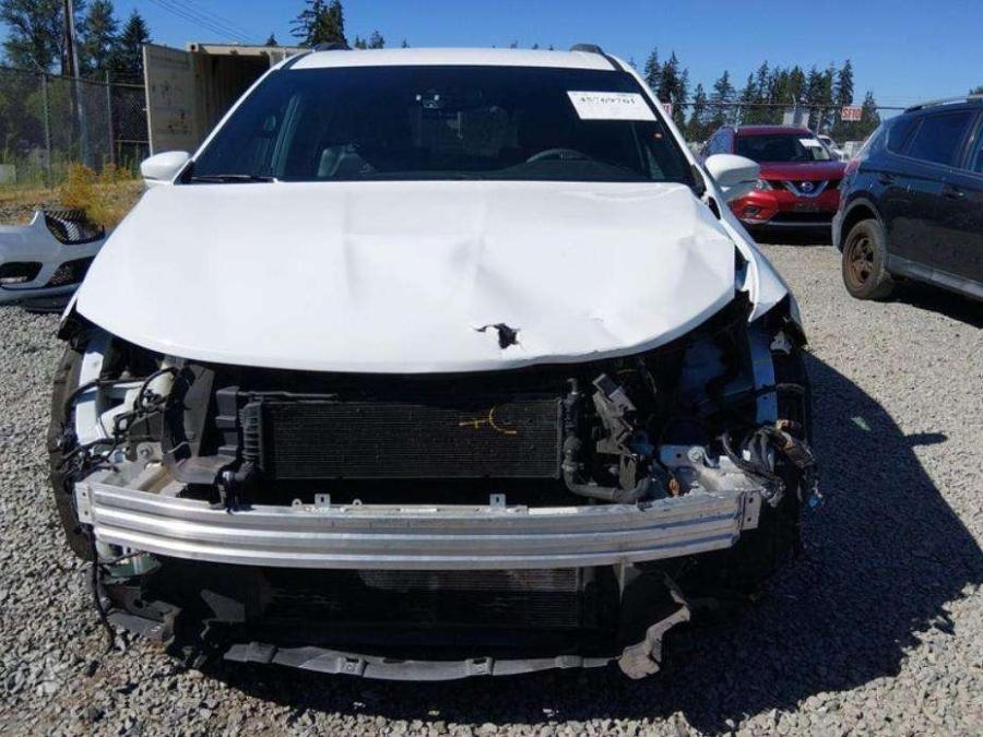 White Chrysler Pacifica 2022 in Kaunas, with an engine capacity of 3.61 L and mileage of 80 thousand km for 16456 €, photo 12 on AUTOMOTO.COM.LV