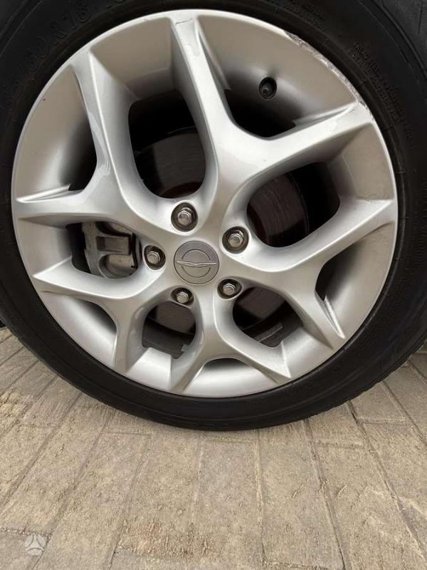 White Chrysler Pacifica 2020 in Kaunas, with an engine capacity of 3.60 L and mileage of 177 thousand km for 17800 €, photo 11 on AUTOMOTO.COM.LV