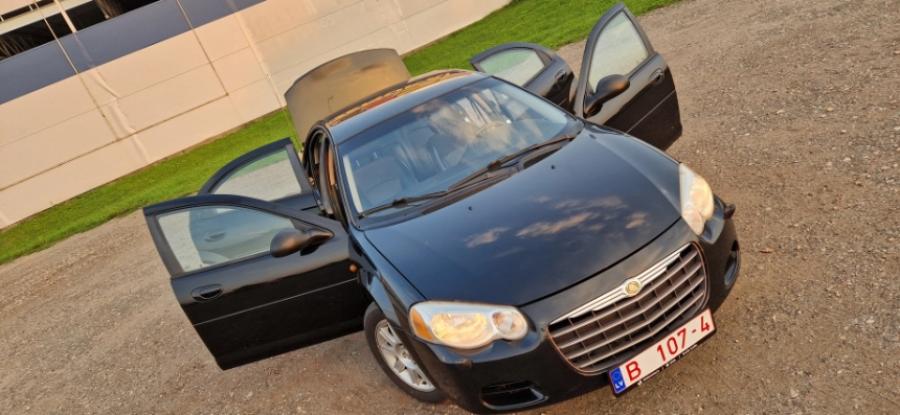 Black Chrysler Sebring 2005 in Riga, with an engine capacity of 2.40 L and mileage of 193 thousand km for 1650 €, photo 32 on AUTOMOTO.COM.LV