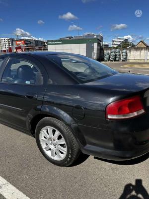 Melns Chrysler Sebring 2006 Viļņa, ar dzinēja tilpumu 2.74 L un nobraukumu 71 tūkst. km par 2500 €, foto 14 vietnē AUTOMOTO.COM.LV