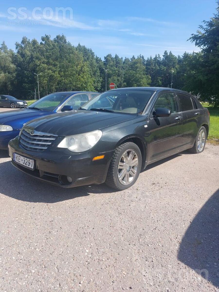 Black Chrysler Sebring 2007 in Riga, with an engine capacity of 2.40 L and mileage of 325 thousand km for 950 €, photo 1 on AUTOMOTO.COM.LV
