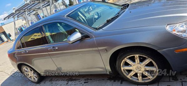 Pelēks Chrysler Sebring 2007 Viljandi, ar dzinēja tilpumu 2.40 L un nobraukumu 245 tūkst. km par 1200 €, foto 2 vietnē AUTOMOTO.COM.LV