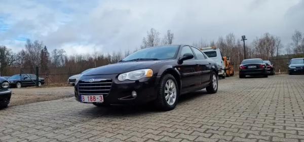 Sarkans Chrysler Sebring 2004 Valmiera, ar dzinēja tilpumu 2.70 L un nobraukumu 163 tūkst. km par 1400 €, foto 7 vietnē AUTOMOTO.COM.LV