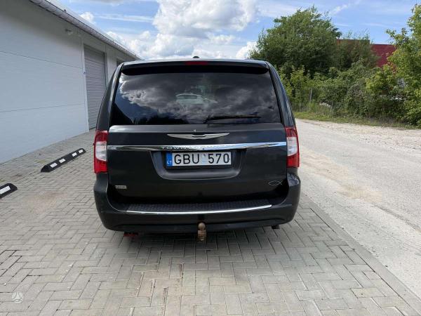 Melns Chrysler town-&-country 2011 Kauņa, ar dzinēja tilpumu 3.61 L un nobraukumu 391 tūkst. km par 4800 €, foto 6 vietnē AUTOMOTO.COM.LV