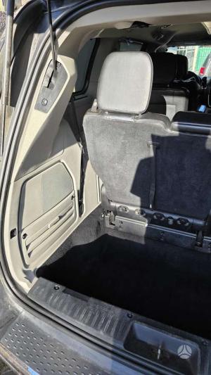 Melns Chrysler town-&-country 2011 Viļņa, ar dzinēja tilpumu 3.60 L un nobraukumu 193 tūkst. km par 8400 €, foto  vietnē AUTOMOTO.COM.LV