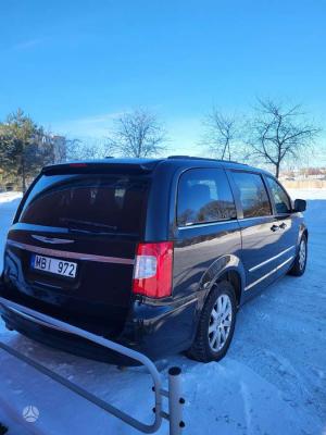 Melns Chrysler town-&-country 2013 Mažeikiai, ar dzinēja tilpumu 3.60 L un nobraukumu 236 tūkst. km par 7900 €, foto 4 vietnē AUTOMOTO.COM.LV