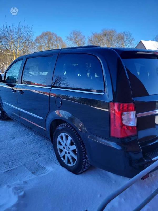 Melns Chrysler town-&-country 2013 Mažeikiai, ar dzinēja tilpumu 3.60 L un nobraukumu 236 tūkst. km par 7900 €, foto 5 vietnē AUTOMOTO.COM.LV