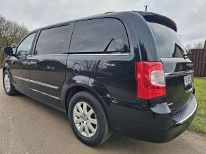 Black Chrysler town-&-country 2014 in Kaunas, with an engine capacity of 3.60 L and mileage of 243 thousand km for 5999 €, photo 13 on AUTOMOTO.COM.LV