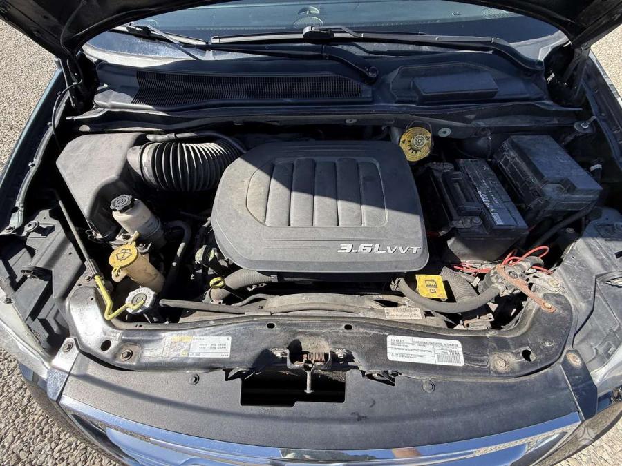Melns Chrysler town-&-country 2015 Viļņa, ar dzinēja tilpumu 3.60 L un nobraukumu 216 tūkst. km par 7500 €, foto 41 vietnē AUTOMOTO.COM.LV
