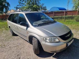 Pelēks Chrysler town-&-country 2003 Šauļi, ar dzinēja tilpumu 3.30 L un nobraukumu 350 tūkst. km par 480 €, foto  vietnē AUTOMOTO.COM.LV