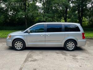 Pelēks Chrysler town-&-country 2012 Rīga, ar dzinēja tilpumu 3.60 L un nobraukumu 0 tūkst. km par 5590 €, foto 3 vietnē AUTOMOTO.COM.LV