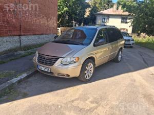 Orange Chrysler town-&-country 2005 in Riga, with an engine capacity of 3.80 L and mileage of 142 thousand km for 700 €, photo  on AUTOMOTO.COM.LV