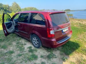 Sarkans Chrysler town-&-country 2011 Rīga, ar dzinēja tilpumu 3.60 L un nobraukumu 330 tūkst. km par 1600 €, foto 3 vietnē AUTOMOTO.COM.LV