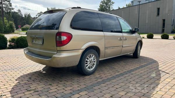 Chrysler town-&-country 2002 Rīga vietnē Dzeltens Chrysler town-&-country 2002 Rīga, ar dzinēja tilpumu 3.30 L un nobraukumu 244 tūkst. km par 850 €, foto 3 vietnē AUTOMOTO.COM.LV