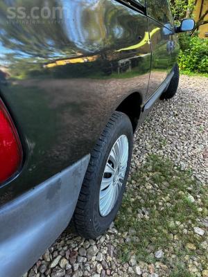 Black Chrysler Voyager 2000 in Jelgava, with an engine capacity of 2.40 L and mileage of 360 thousand km for 2000 €, photo 4 on AUTOMOTO.COM.LV