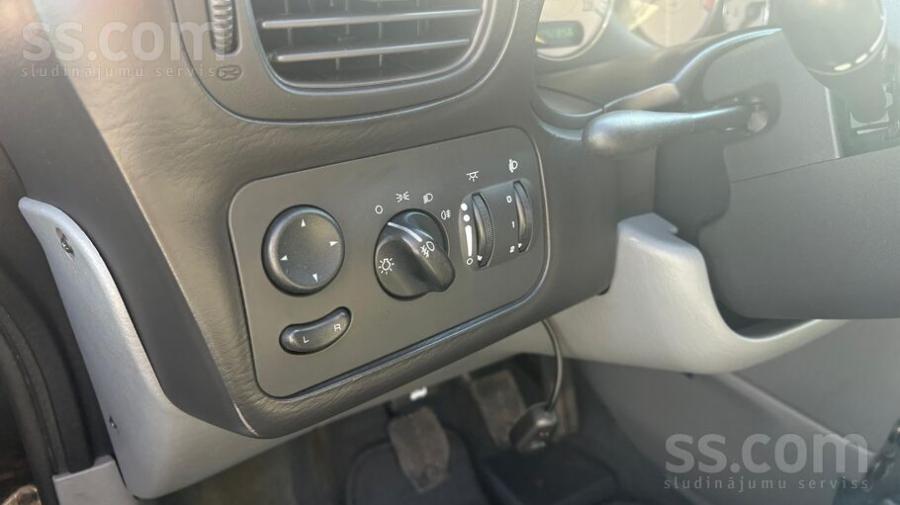 Black Chrysler Voyager 2004 in Liepaja, with an engine capacity of 2.50 L and mileage of 420 thousand km for 2350 €, photo 13 on AUTOMOTO.COM.LV