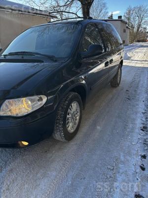Black Chrysler Voyager 2005 in Riga, with an engine capacity of 2.80 L and mileage of 265 thousand km for 2750 €, photo 12 on AUTOMOTO.COM.LV