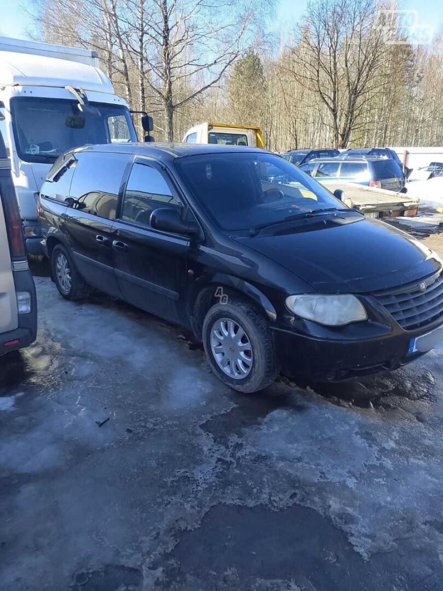 Black Chrysler Voyager 2005 in Vilnius, with an engine capacity of 2.80 L and mileage of 300 thousand km for 699 €, photo 1 on AUTOMOTO.COM.LV