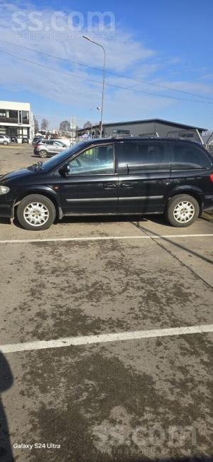Black Chrysler Voyager 2005 in Riga, with an engine capacity of 2.40 L and mileage of 261 thousand km for 2000 €, photo  on AUTOMOTO.COM.LV