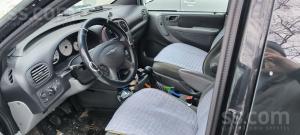 Black Chrysler Voyager 2005 in Riga, with an engine capacity of 2.40 L and mileage of 261 thousand km for 2000 €, photo 6 on AUTOMOTO.COM.LV