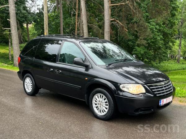 Black Chrysler Voyager 2005 in Riga, with an engine capacity of 2.80 L and mileage of 0 thousand km for 2799 €, photo 7 on AUTOMOTO.COM.LV