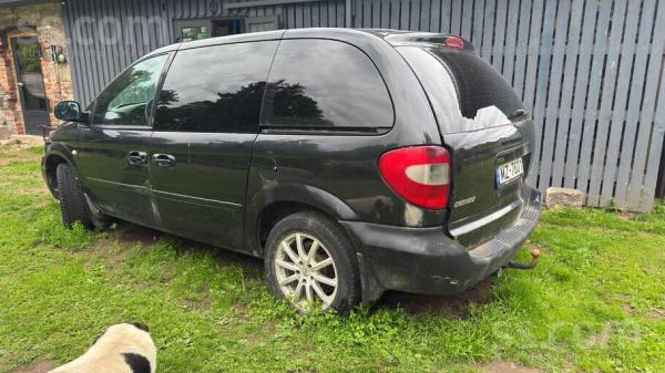 Melns Chrysler Voyager 2005 Ogre, ar dzinēja tilpumu 2.80 L un nobraukumu 410 tūkst. km par 600 €, foto 4 vietnē AUTOMOTO.COM.LV