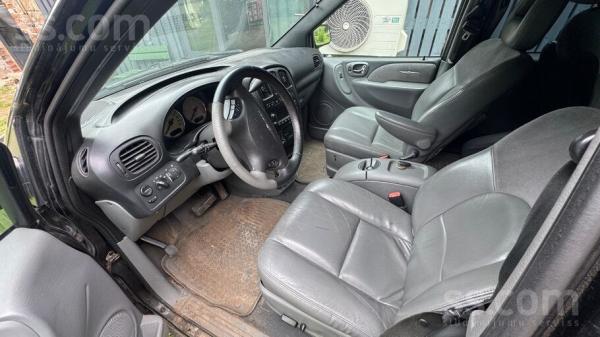 Melns Chrysler Voyager 2005 Ogre, ar dzinēja tilpumu 2.80 L un nobraukumu 410 tūkst. km par 600 €, foto 5 vietnē AUTOMOTO.COM.LV