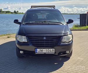 Melns Chrysler Voyager 2005 Liepāja, ar dzinēja tilpumu 2.80 L un nobraukumu 398 tūkst. km par 2500 €, foto 3 vietnē AUTOMOTO.COM.LV