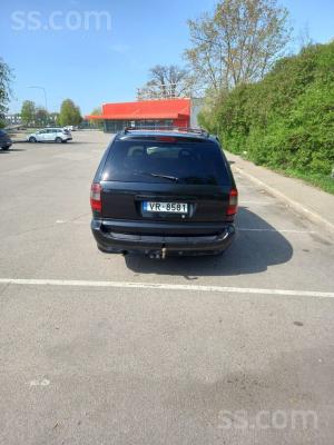 Black Chrysler Voyager 2005 in Riga, with an engine capacity of 2.80 L and mileage of 300 thousand km for 500 €, photo 8 on AUTOMOTO.COM.LV