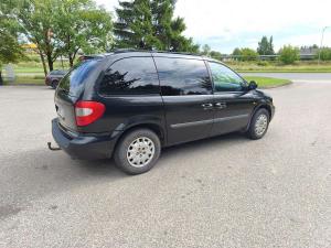 Black Chrysler Voyager 2005 in Panevezys, with an engine capacity of 2.43 L and mileage of 364 thousand km for 600 €, photo 5 on AUTOMOTO.COM.LV