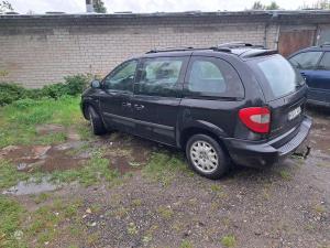 Black Chrysler Voyager 2005 in Marijampole, with an engine capacity of 2.50 L and mileage of 273 thousand km for 699 €, photo 3 on AUTOMOTO.COM.LV