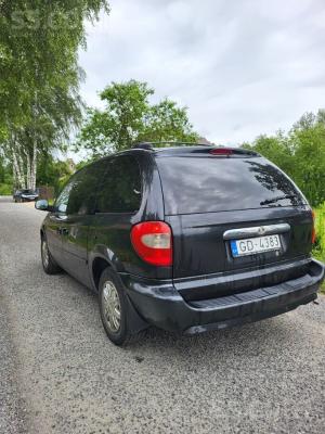 Melns Chrysler Voyager 2006 Rīga, ar dzinēja tilpumu 2.80 L un nobraukumu 241 tūkst. km par 2390 €, foto 3 vietnē AUTOMOTO.COM.LV