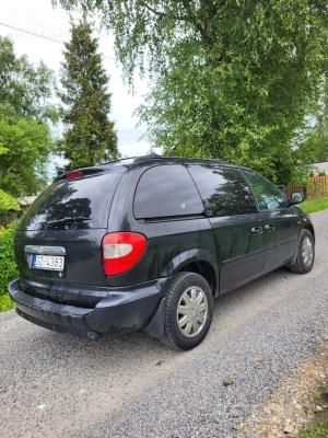 Melns Chrysler Voyager 2006 Rīga, ar dzinēja tilpumu 2.80 L un nobraukumu 241 tūkst. km par 2390 €, foto 4 vietnē AUTOMOTO.COM.LV
