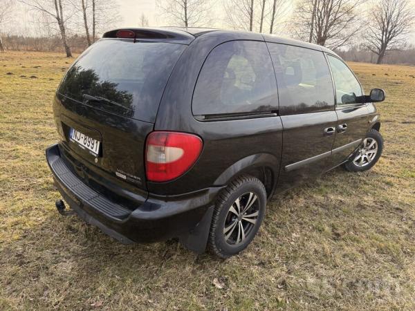 Melns Chrysler Voyager 2007 Jelgava, ar dzinēja tilpumu 2.80 L un nobraukumu 263 tūkst. km par 1000 €, foto 4 vietnē AUTOMOTO.COM.LV