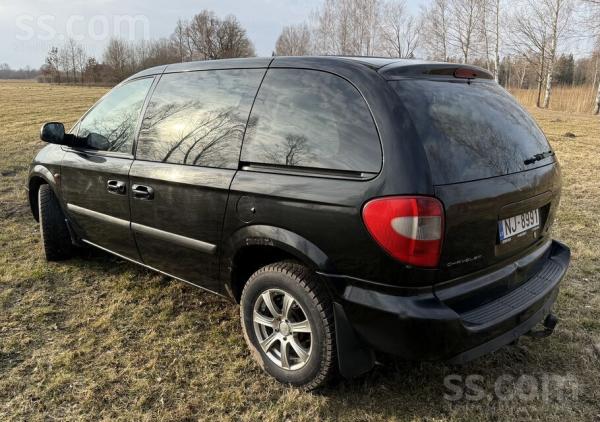 Melns Chrysler Voyager 2007 Jelgava, ar dzinēja tilpumu 2.80 L un nobraukumu 263 tūkst. km par 1000 €, foto 5 vietnē AUTOMOTO.COM.LV