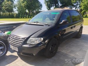 Melns Chrysler Voyager 2007 Rīga, ar dzinēja tilpumu 2.80 L un nobraukumu 264 tūkst. km par 3350 €, foto  vietnē AUTOMOTO.COM.LV