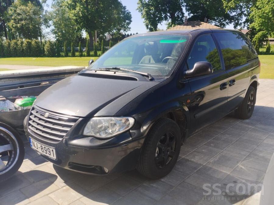 Black Chrysler Voyager 2007 in Riga, with an engine capacity of 2.80 L and mileage of 264 thousand km for 3350 €, photo 1 on AUTOMOTO.COM.LV