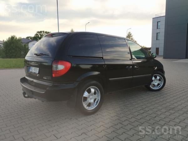 Melns Chrysler Voyager 2007 Rīga, ar dzinēja tilpumu 2.80 L un nobraukumu 264 tūkst. km par 3250 €, foto 4 vietnē AUTOMOTO.COM.LV