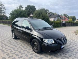 Black Chrysler Voyager 2007 in Riga, with an engine capacity of 2.80 L and mileage of 257 thousand km for 1299 €, photo  on AUTOMOTO.COM.LV