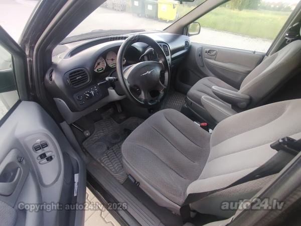Melns Chrysler Voyager 2007 Rīga, ar dzinēja tilpumu 2.80 L un nobraukumu 265 tūkst. km par 2990 €, foto 9 vietnē AUTOMOTO.COM.LV