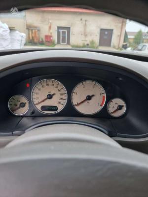 Blue Chrysler Voyager 2003 in Vilnius, with an engine capacity of 2.50 L and mileage of 294 thousand km for 950 €, photo 8 on AUTOMOTO.COM.LV