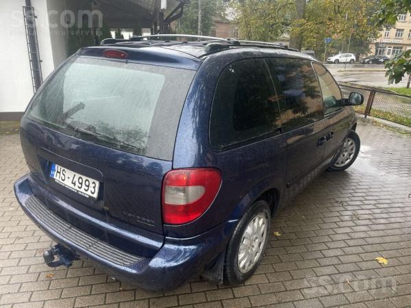 Blue Chrysler Voyager 2005 in Riga, with an engine capacity of 2.80 L and mileage of 298 thousand km for 1600 €, photo 4 on AUTOMOTO.COM.LV