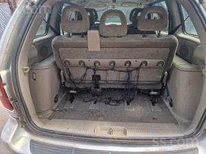 Pelēks Chrysler Voyager 2003 Rīga, ar dzinēja tilpumu 2.50 L un nobraukumu 288 tūkst. km par 900 €, foto 7 vietnē AUTOMOTO.COM.LV